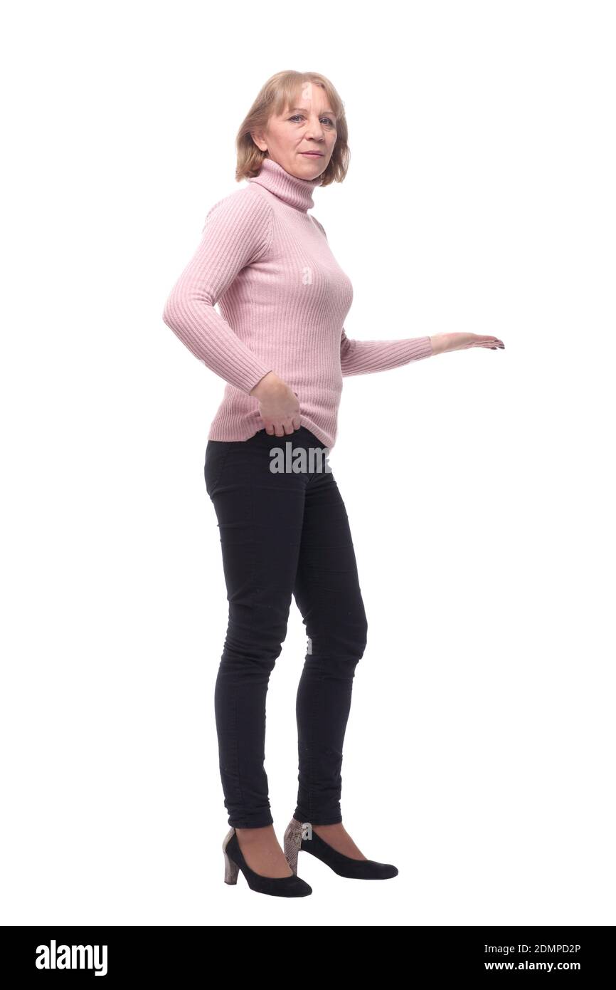 A senior woman - over sixty years old standing on white background ...