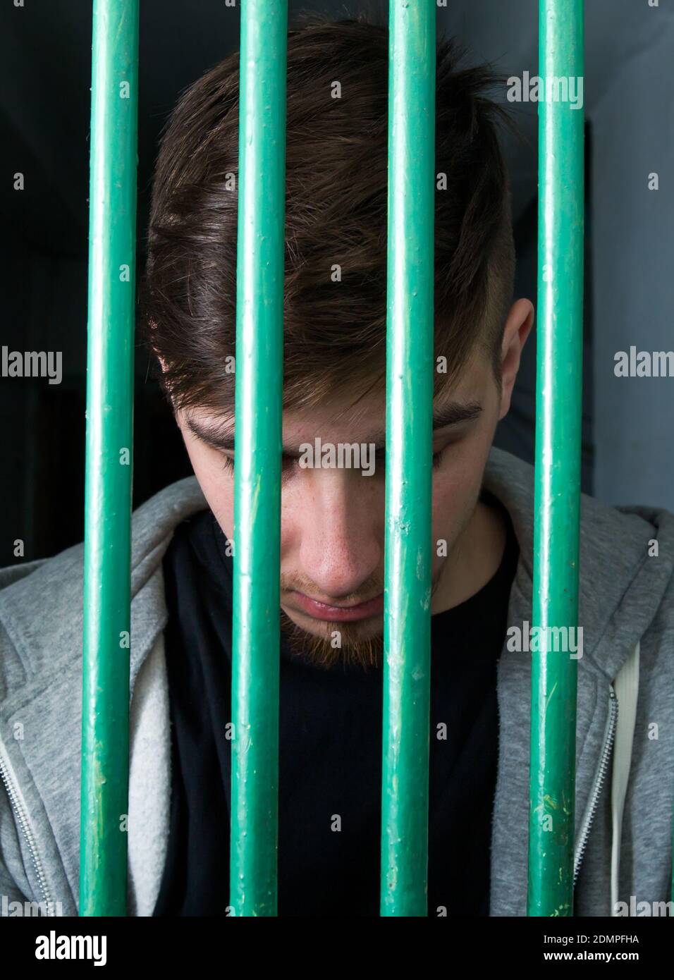 Man behind bars hi-res stock photography and images - Alamy