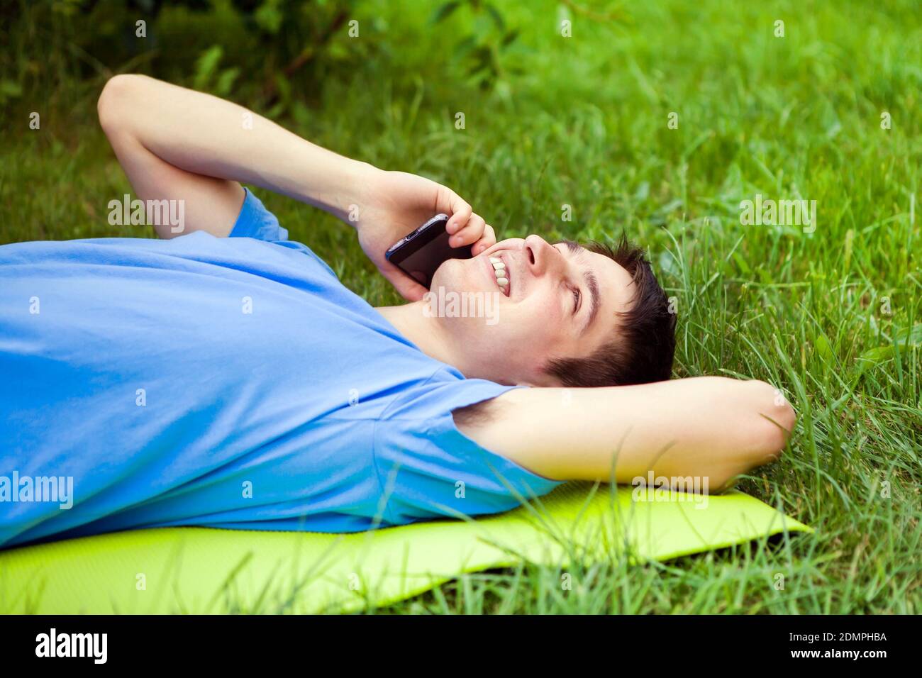 Telephone mobile grass hi-res stock photography and images - Alamy