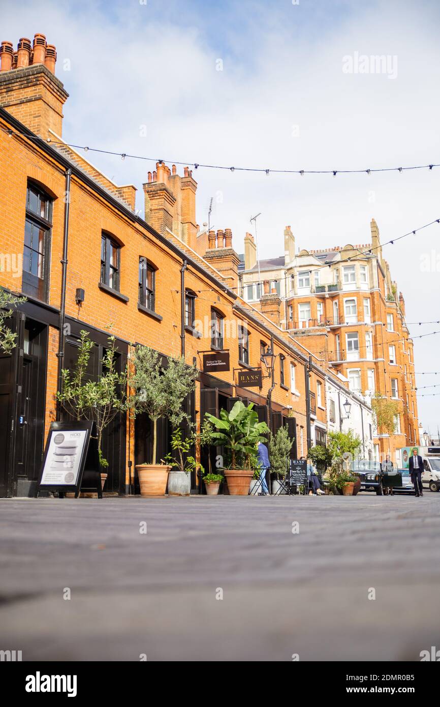 Row of brick buildings with restaurants in Pavilion Road Stock Photo ...