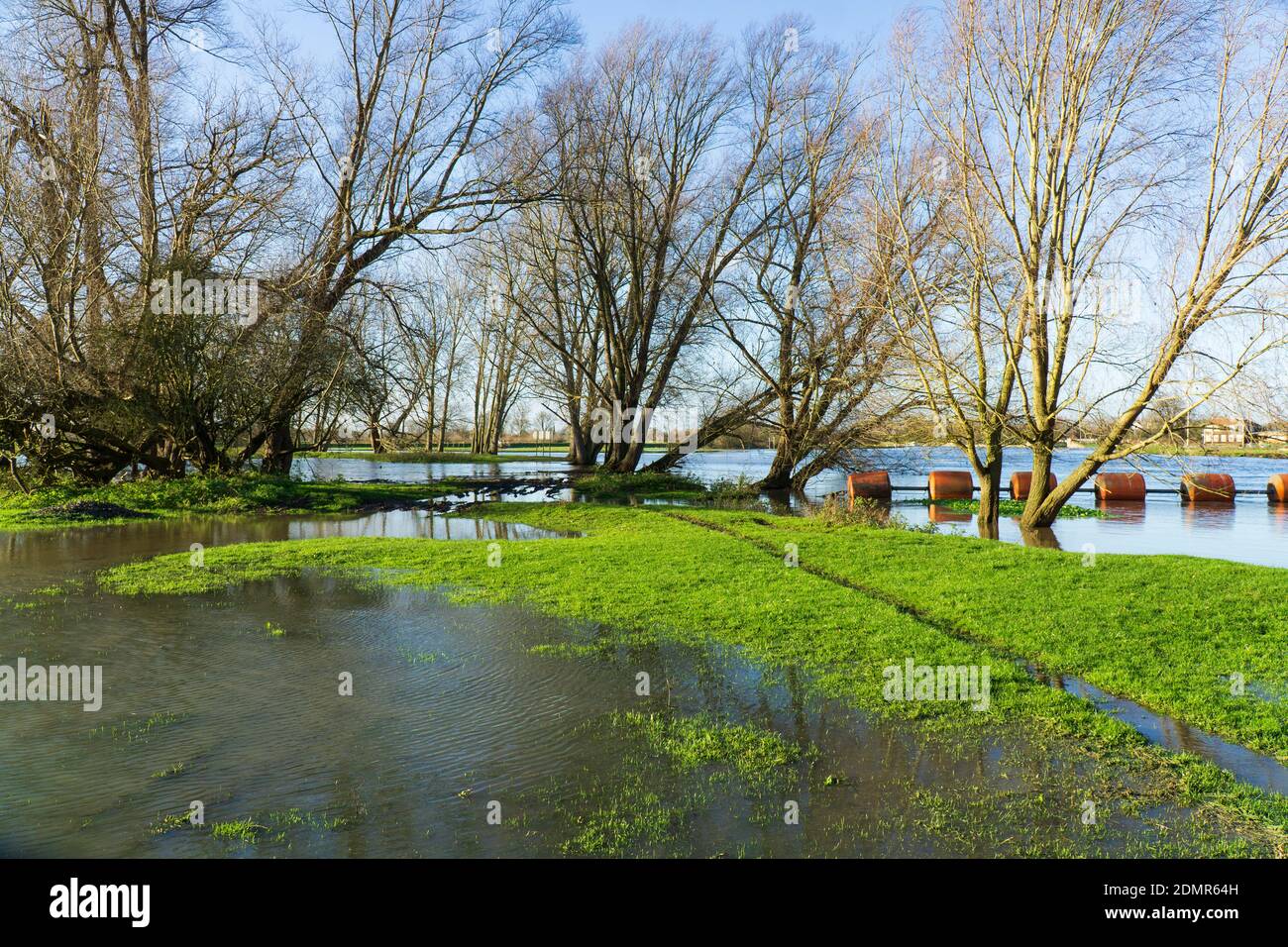 Orange safety boom across a river Stock Photo - Alamy
