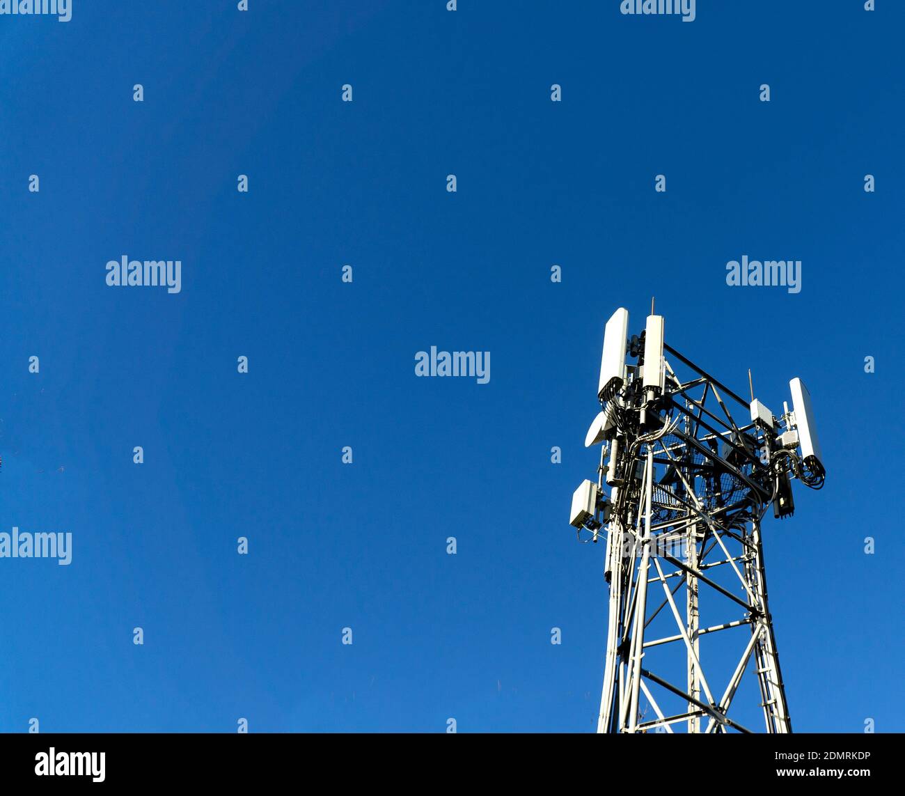 Modern telecommunications mast example Stock Photo - Alamy