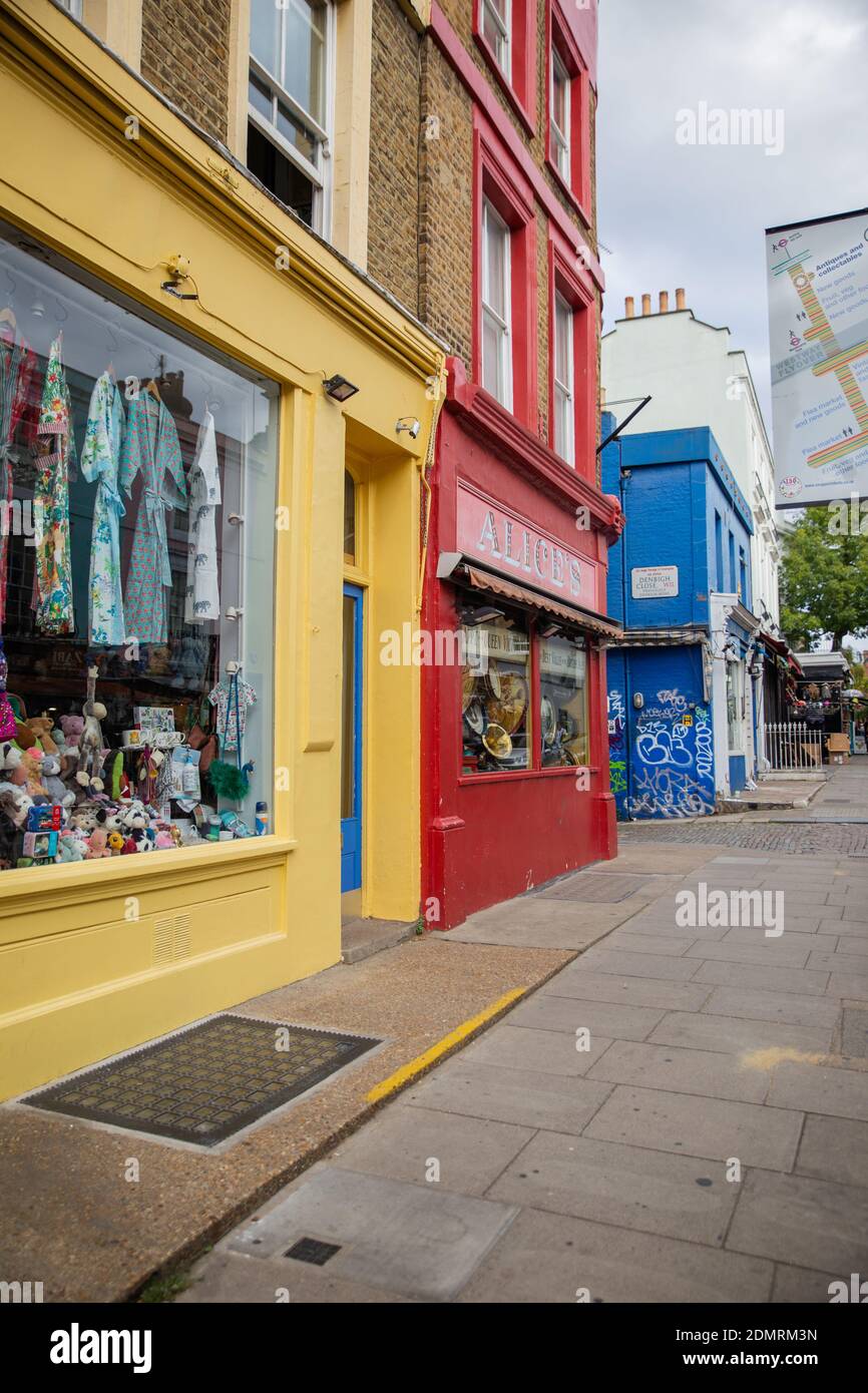 Colorful British antique shops on a street corner from Notting Hill ...