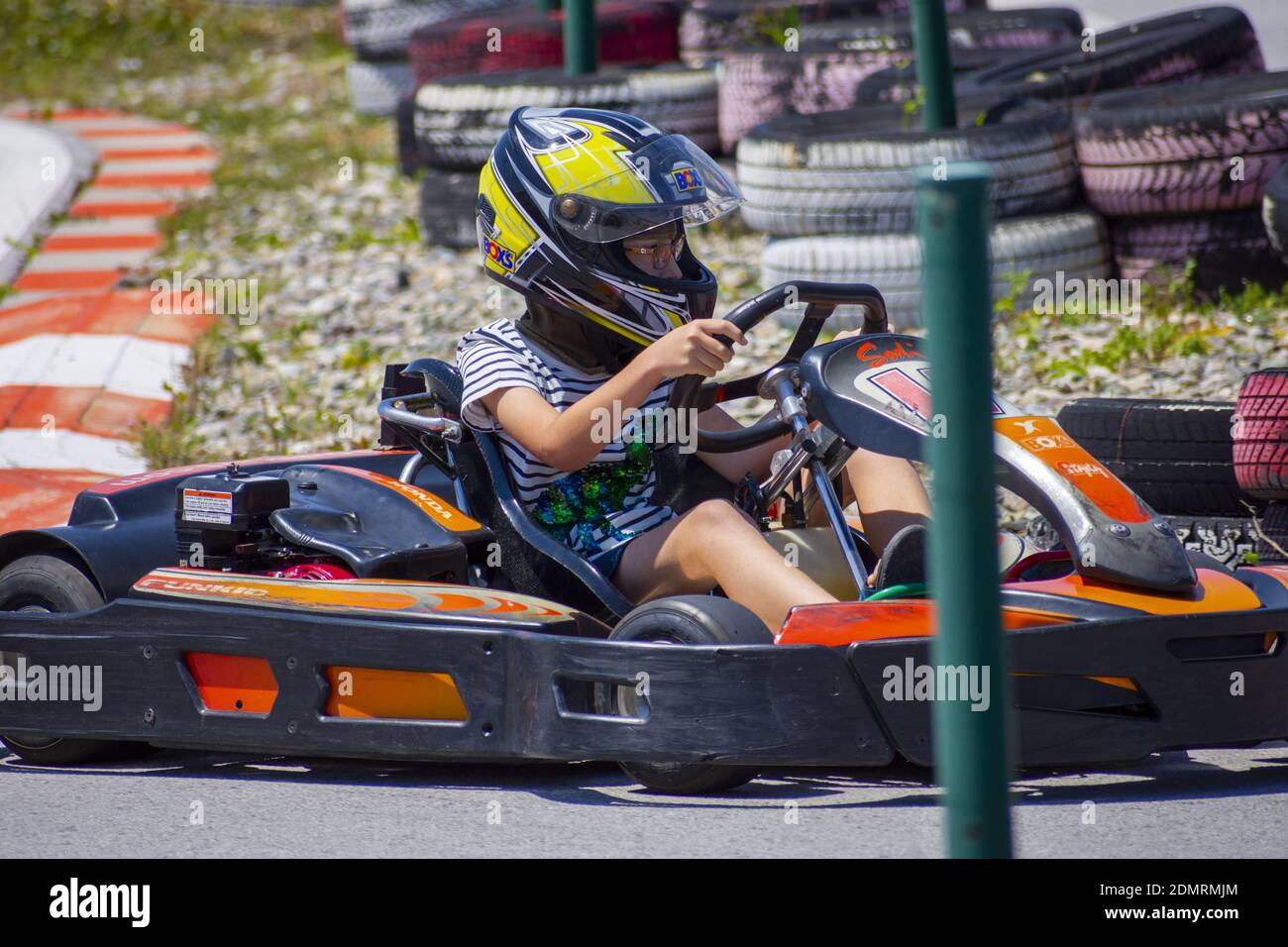 Karting competition or racing car riding for victory on a racetrack ...