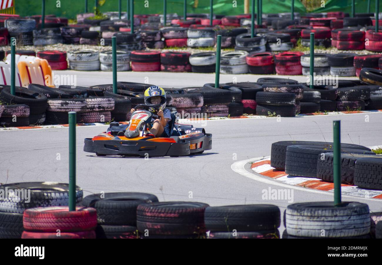 Karting competition or racing car riding for victory on a racetrack ...