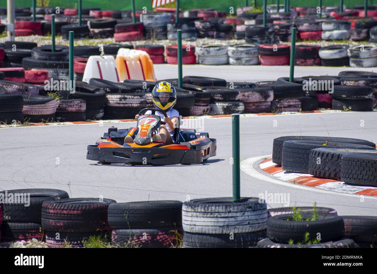 Karting competition or racing car riding for victory on a racetrack ...