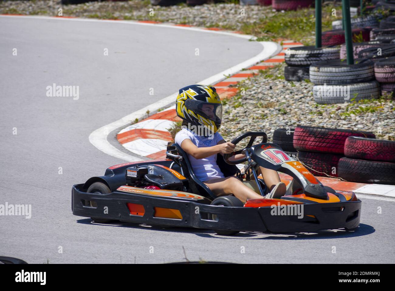 Karting competition or racing car riding for victory on a racetrack ...