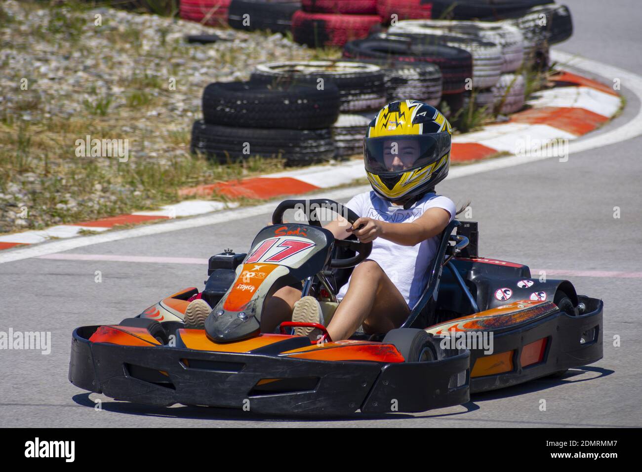 Karting competition or racing car riding for victory on a racetrack ...