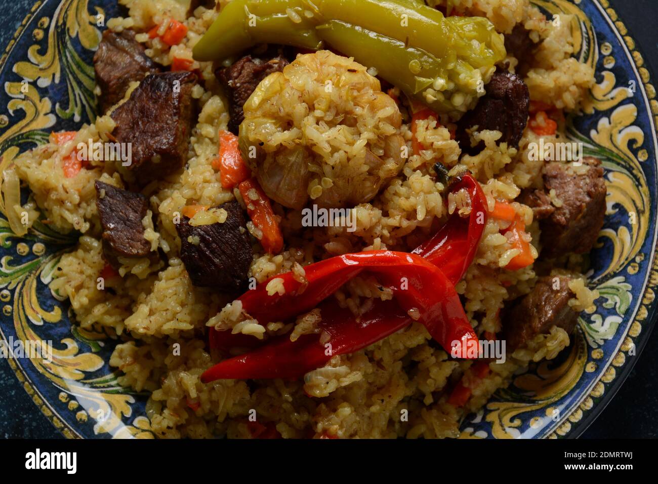 Uzbek cuisine (food) pilaf (plov), salad achichuk (achuchuk).Mutton ...