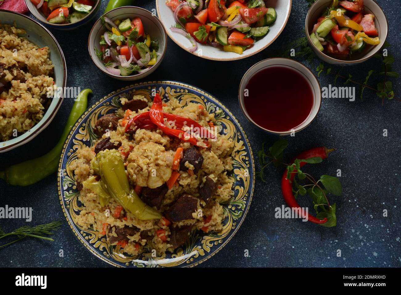 Uzbek cuisine (food) pilaf (plov), salad achichuk (achuchuk).Mutton ...
