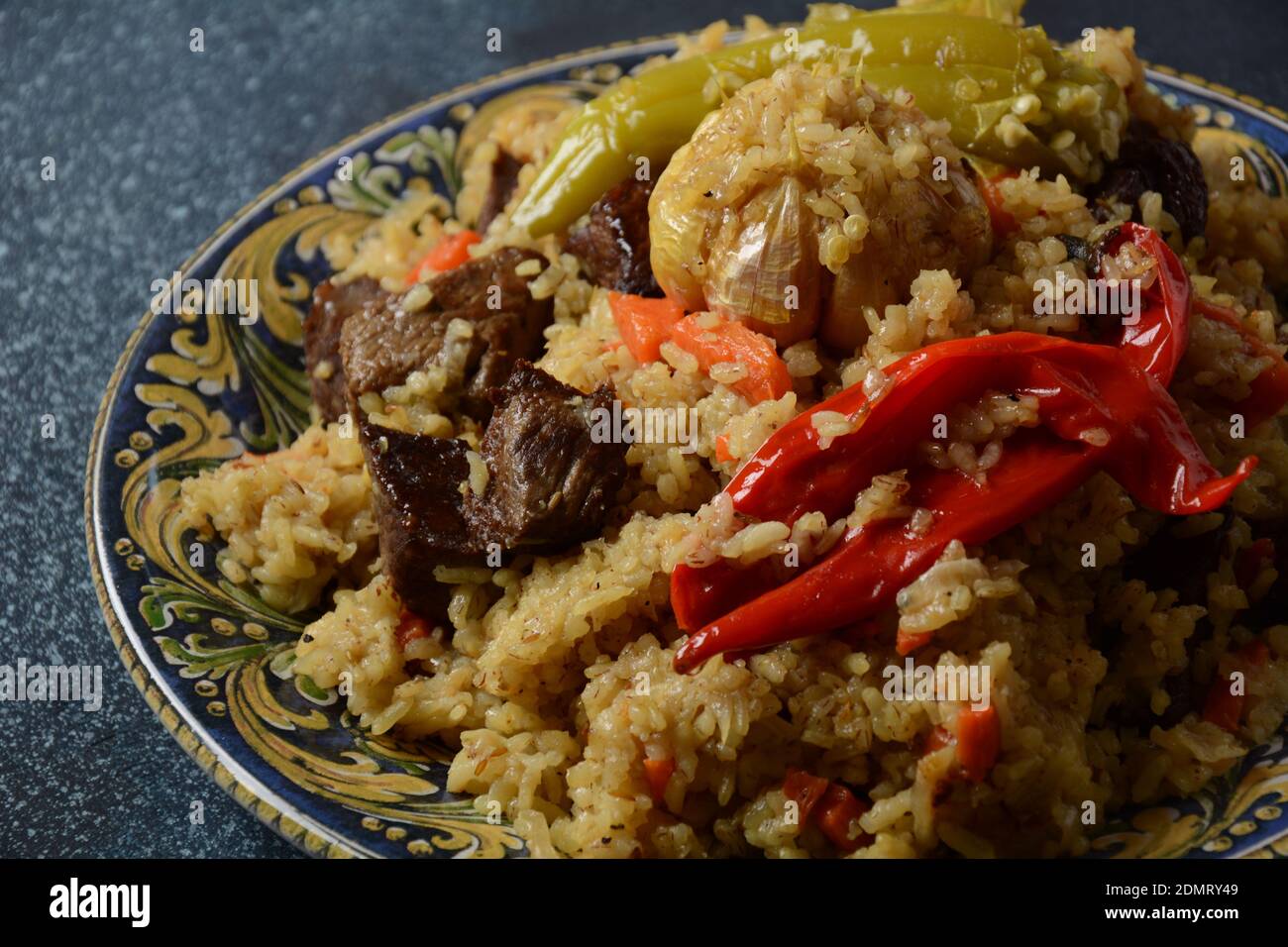 Uzbek cuisine (food) pilaf (plov).Mutton, rice, carrots, vegetable oil ...