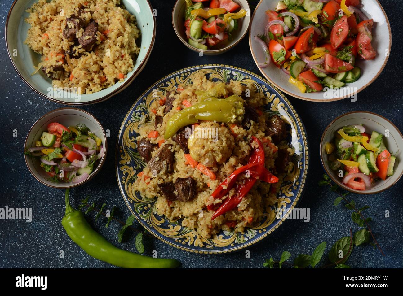 Uzbek cuisine (food) pilaf (plov), salad achichuk (achuchuk).Mutton ...