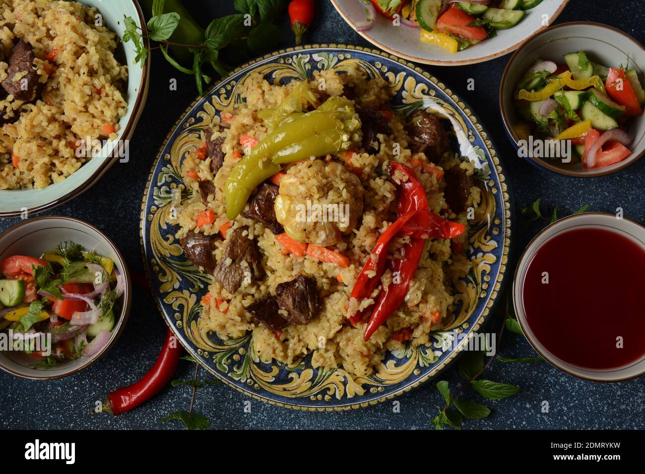 Uzbek cuisine (food) pilaf (plov), salad achichuk (achuchuk).Mutton ...