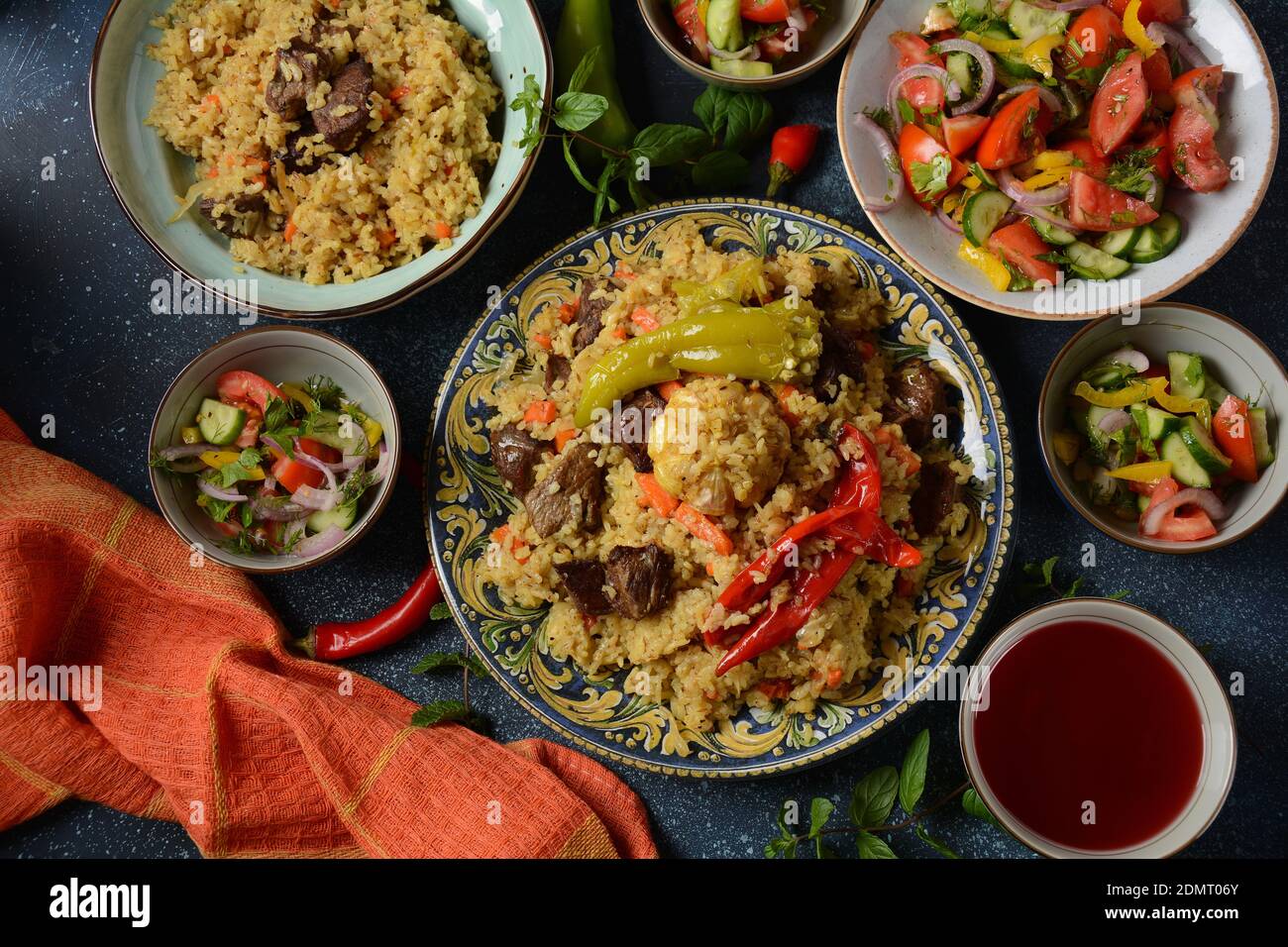 Uzbek cuisine (food) pilaf (plov), salad achichuk (achuchuk).Mutton ...