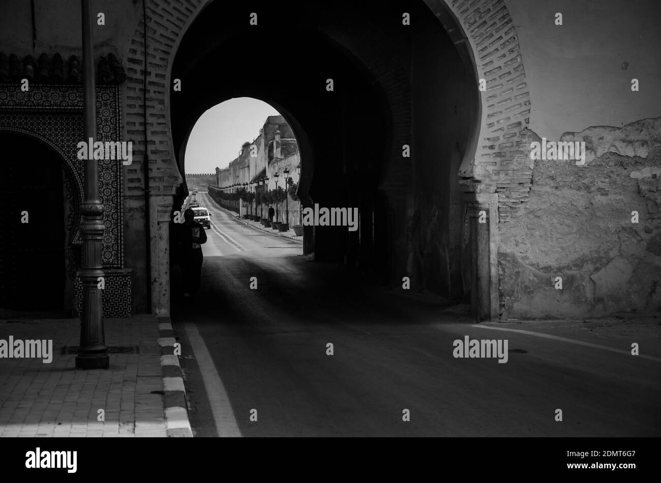 Road Below Arch In City Stock Photo - Alamy