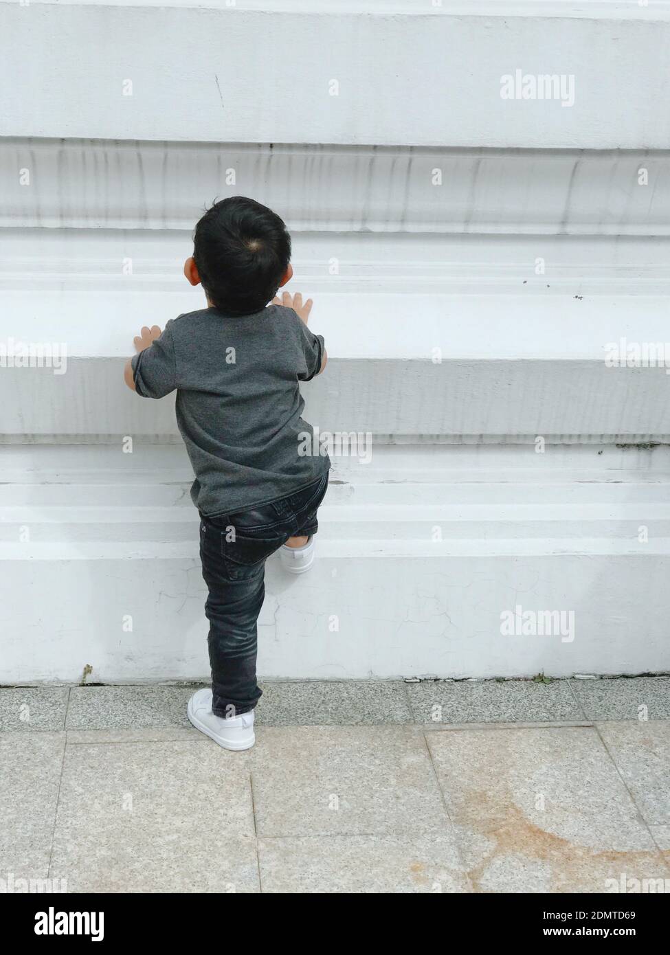Toddler Climbing Steps High Resolution Stock Photography and Images - Alamy