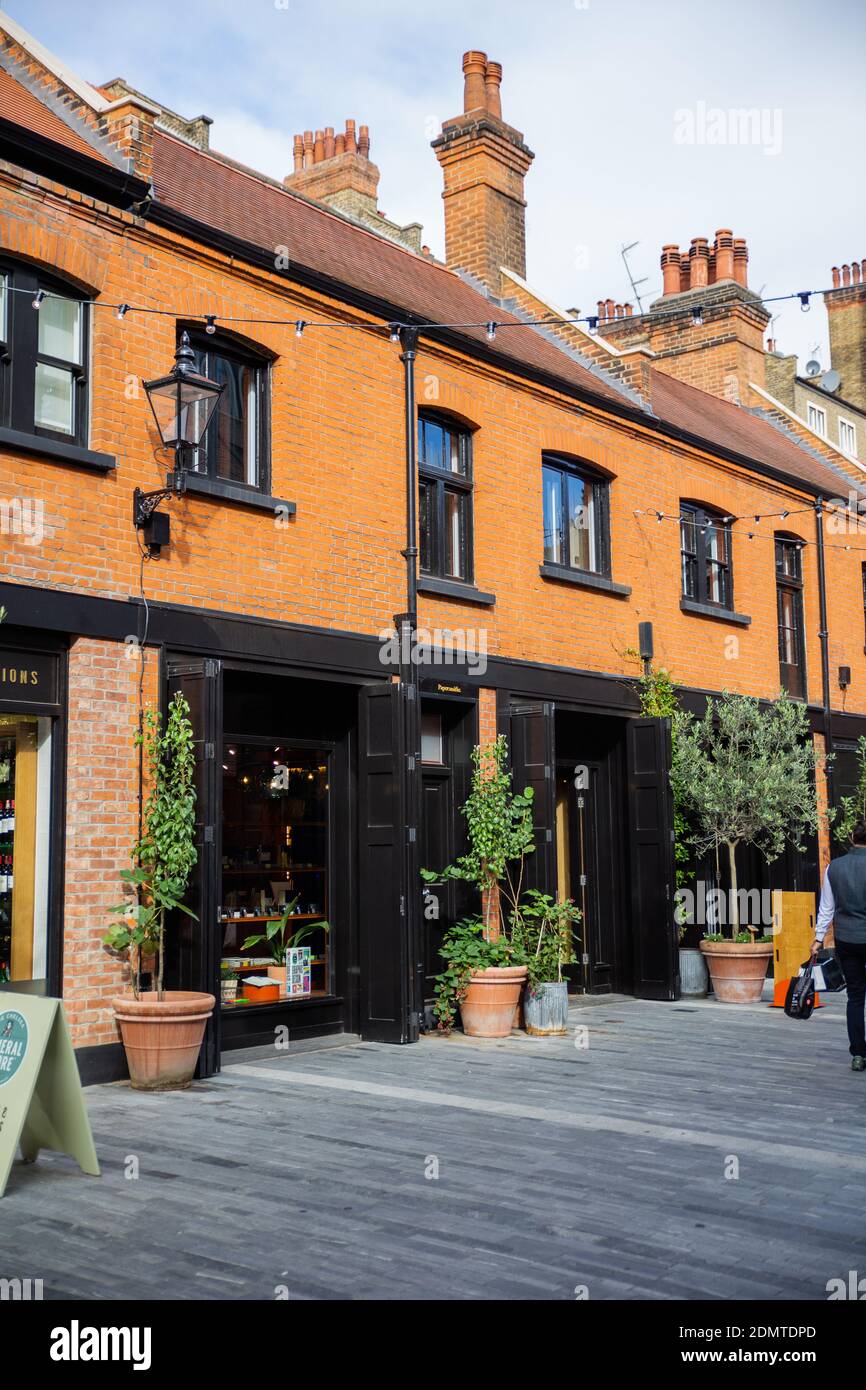 Row of brick buildings with restaurants in Pavilion Road Stock Photo ...
