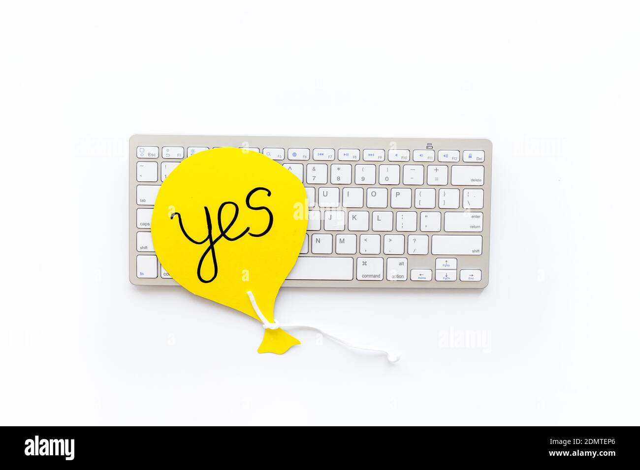 Yes agreement - decision concept. Word Yes on the keyboard, top view ...