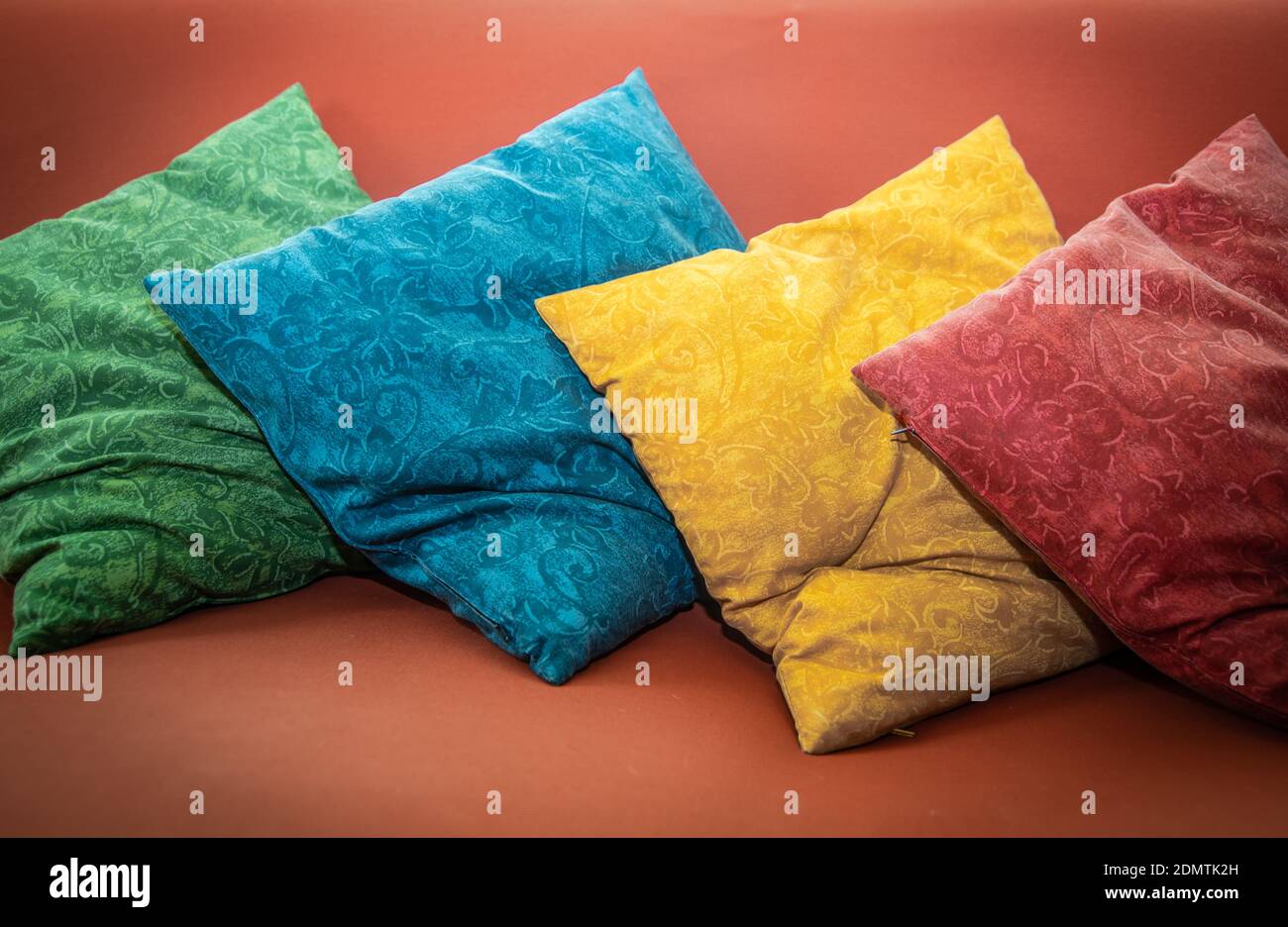 Coral colored cushions hi-res stock photography and images - Alamy