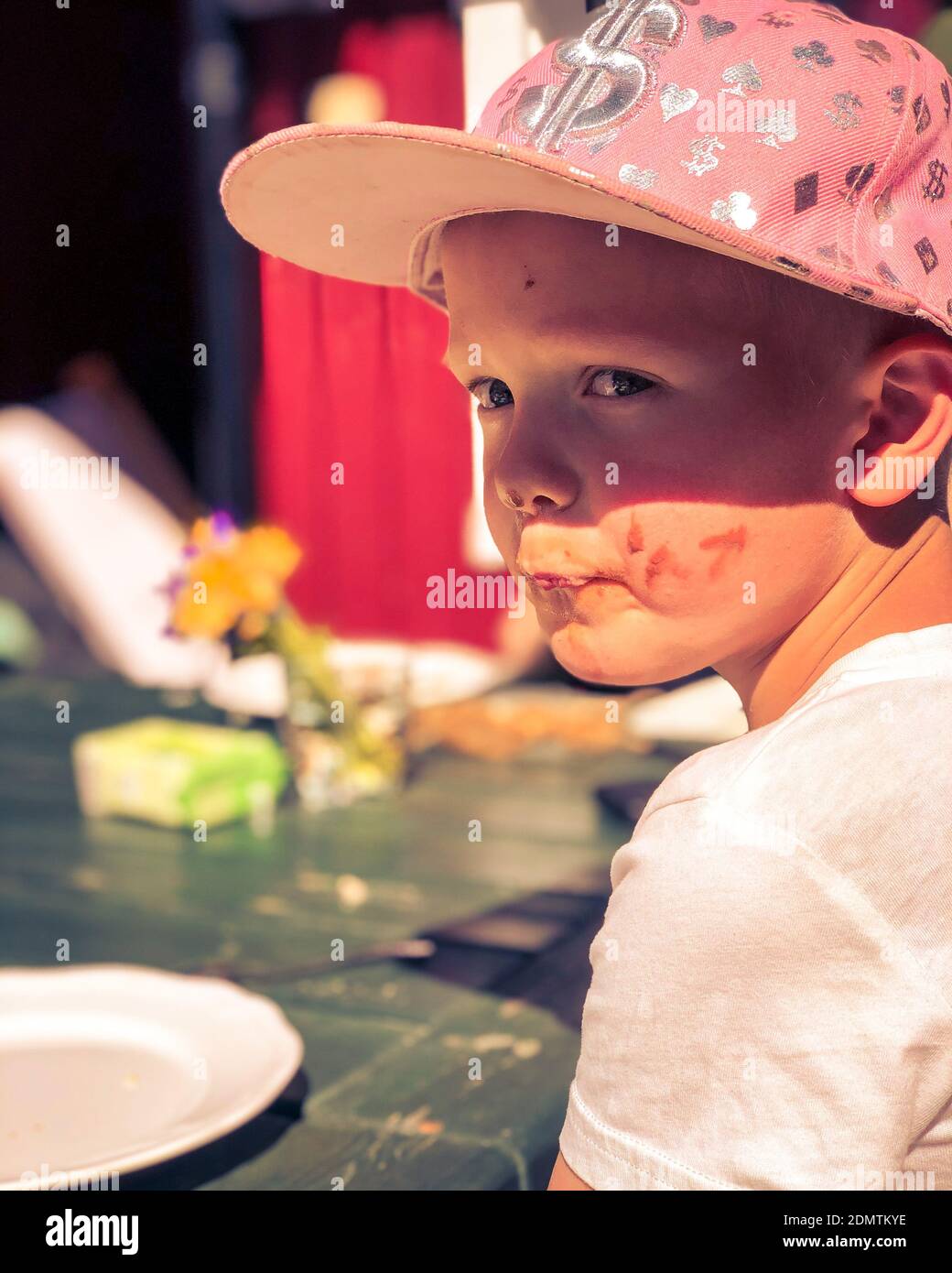 Boy wearing flower hat hi-res stock photography and images - Alamy