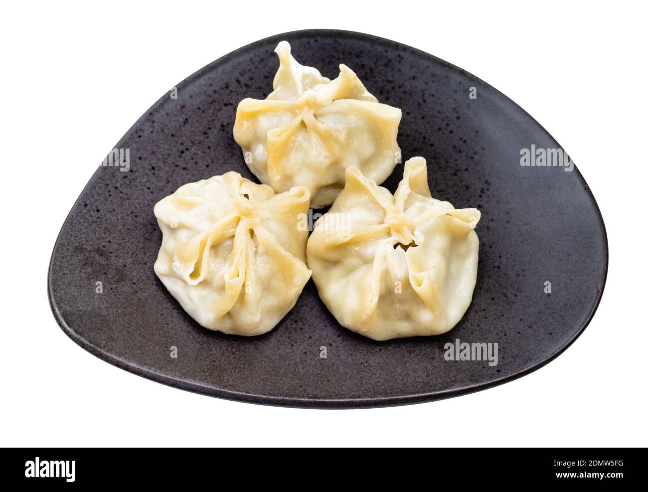 steamed Buuz (Mongolian dumpling filled with minced meat) on black ...