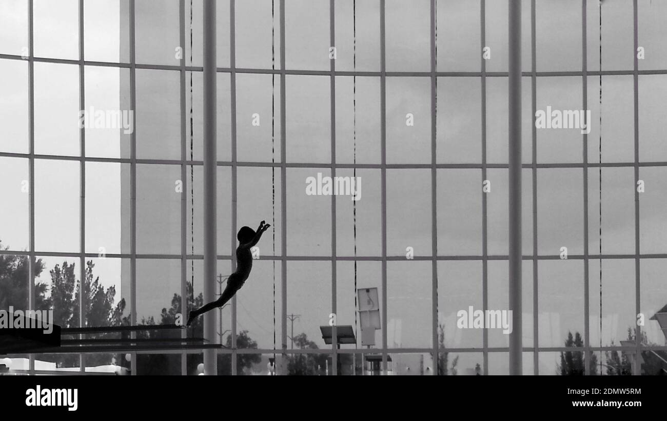 Jumping from diving board hi-res stock photography and images - Alamy