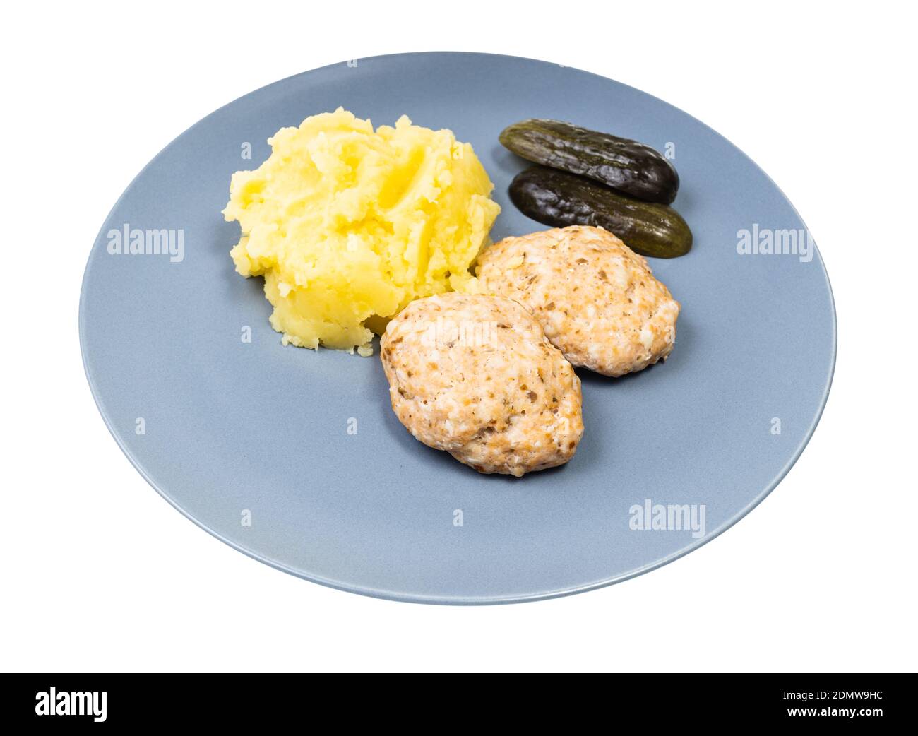 portion of homemade steamed red fish cutlets and mashed potatoes on ...