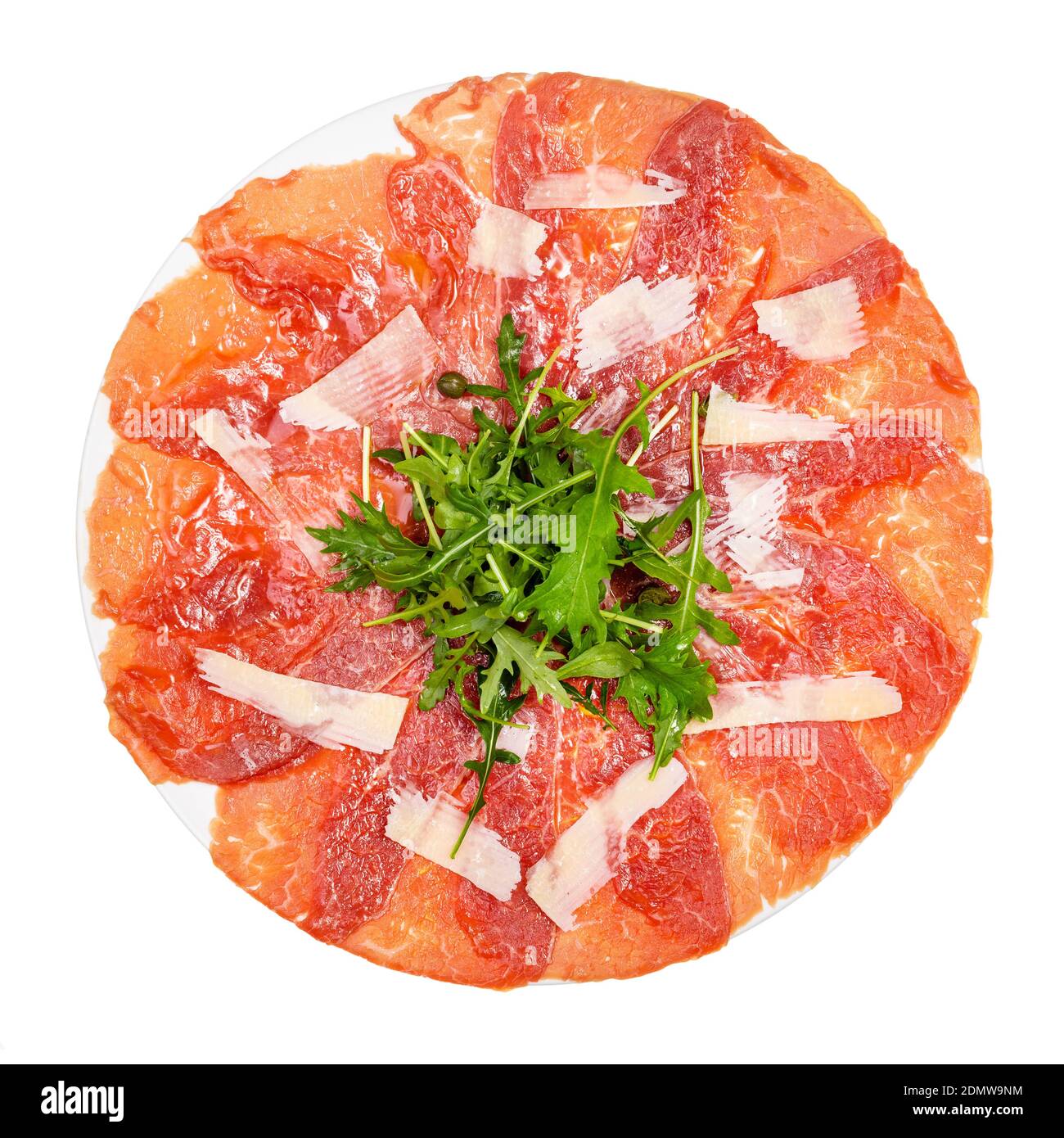 top view of served Carpaccio (thinly sliced raw beef fillet) decorated ...