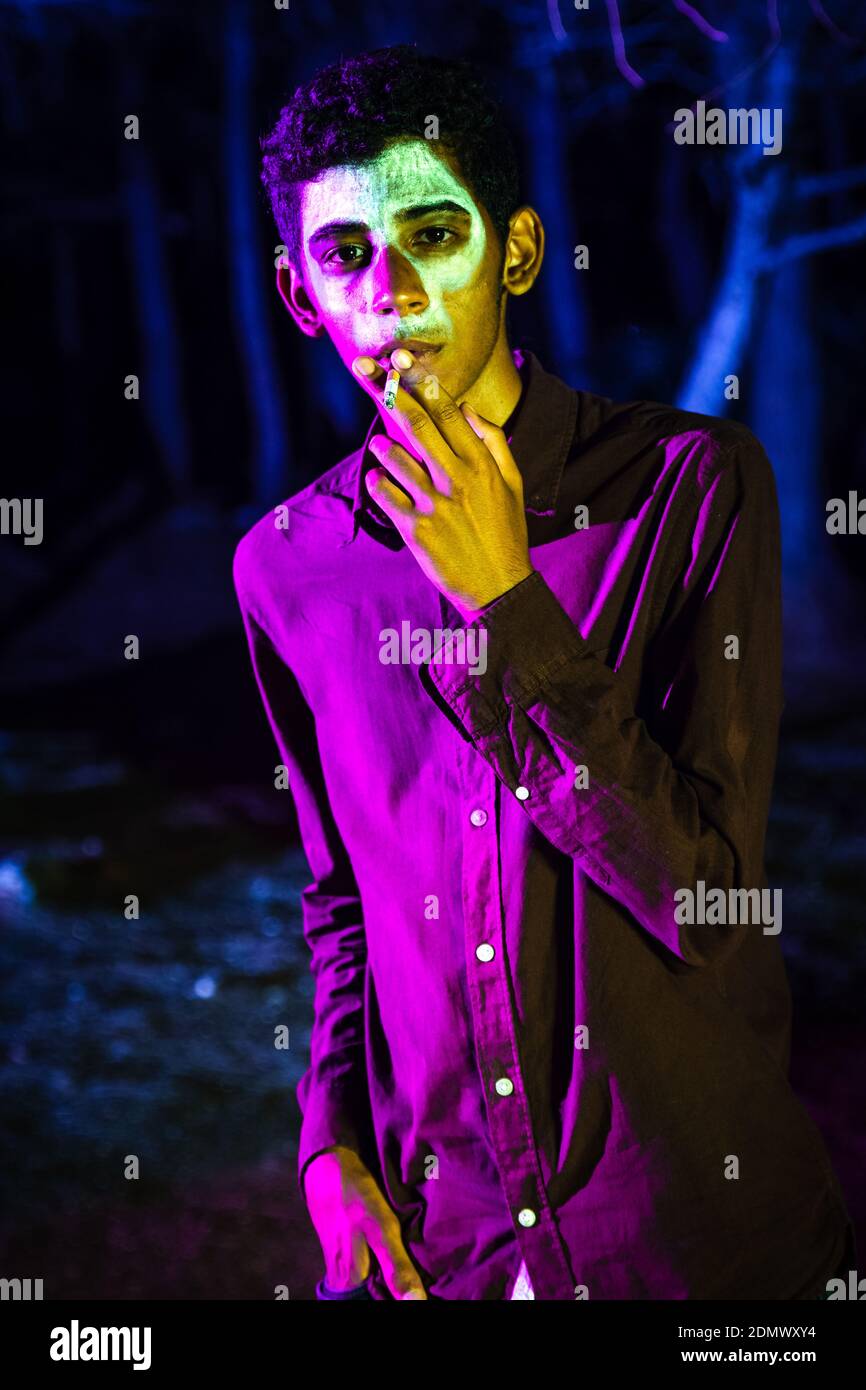 Man smoking in forest addiction hi-res stock photography and images - Alamy
