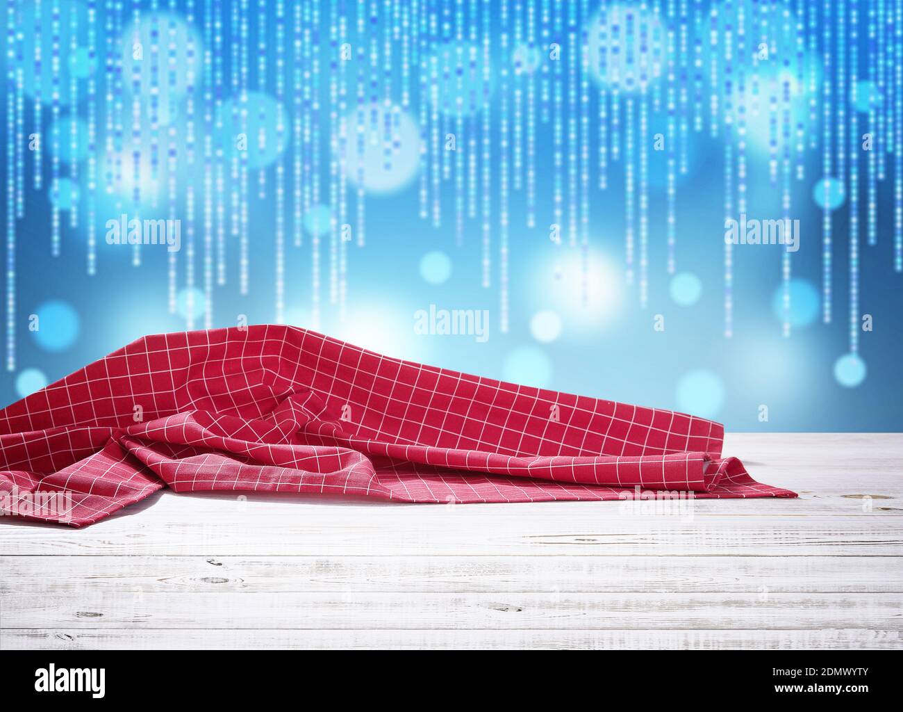 Red napkin on wooden table and Christmas background mockup Stock Photo ...