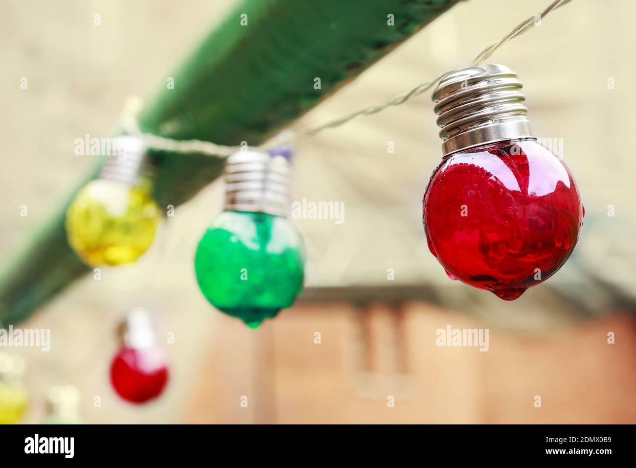 Garland of colorful bulbs. Popular hanging decoration for outdoor ...