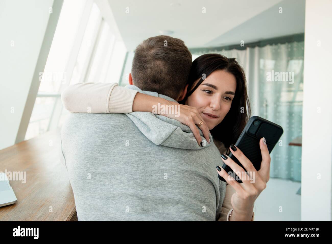 Woman texting other men when embracing her boyfriend. Lies will always ...