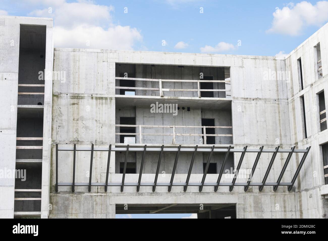 Unfinished abandoned concrete building. Modern architecture concept ...