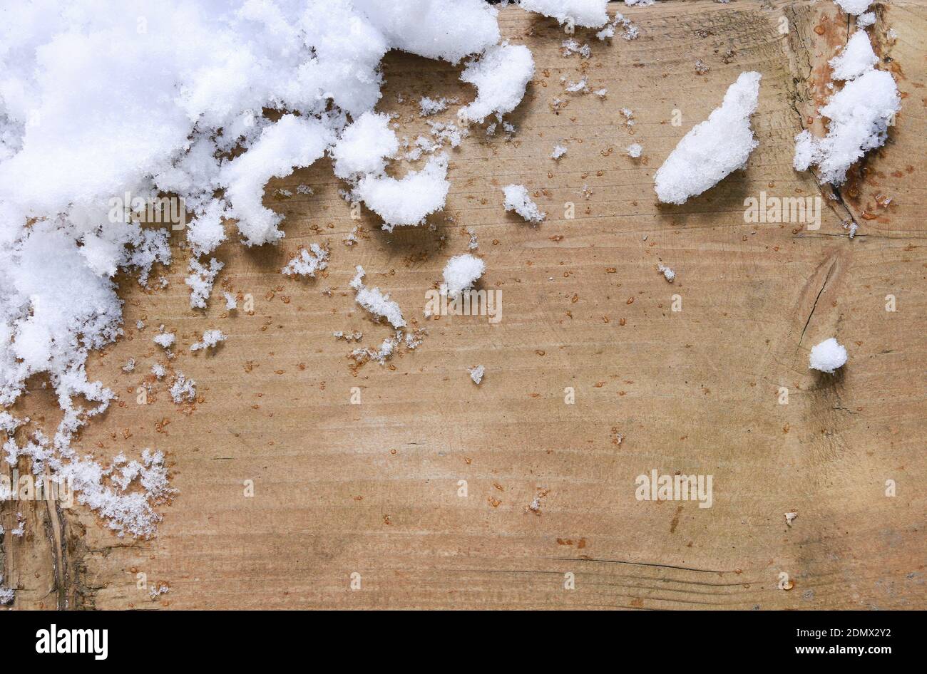 Real, natural snow melting on wooden background. Graphic resources ...