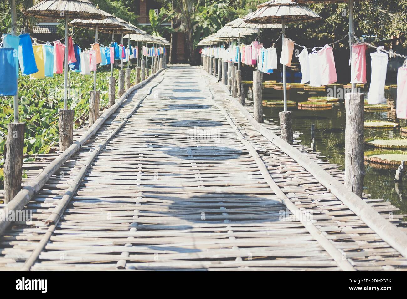 wooden bamboo bridge decorating with colorful fabric lantern Stock ...