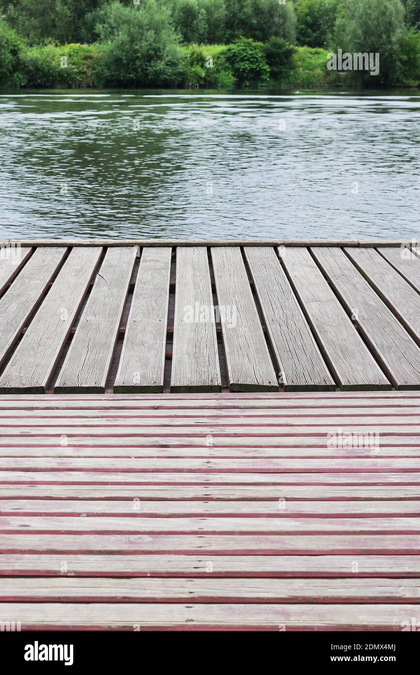 An empty dock at the sunset. Summer time Stock Photo - Alamy