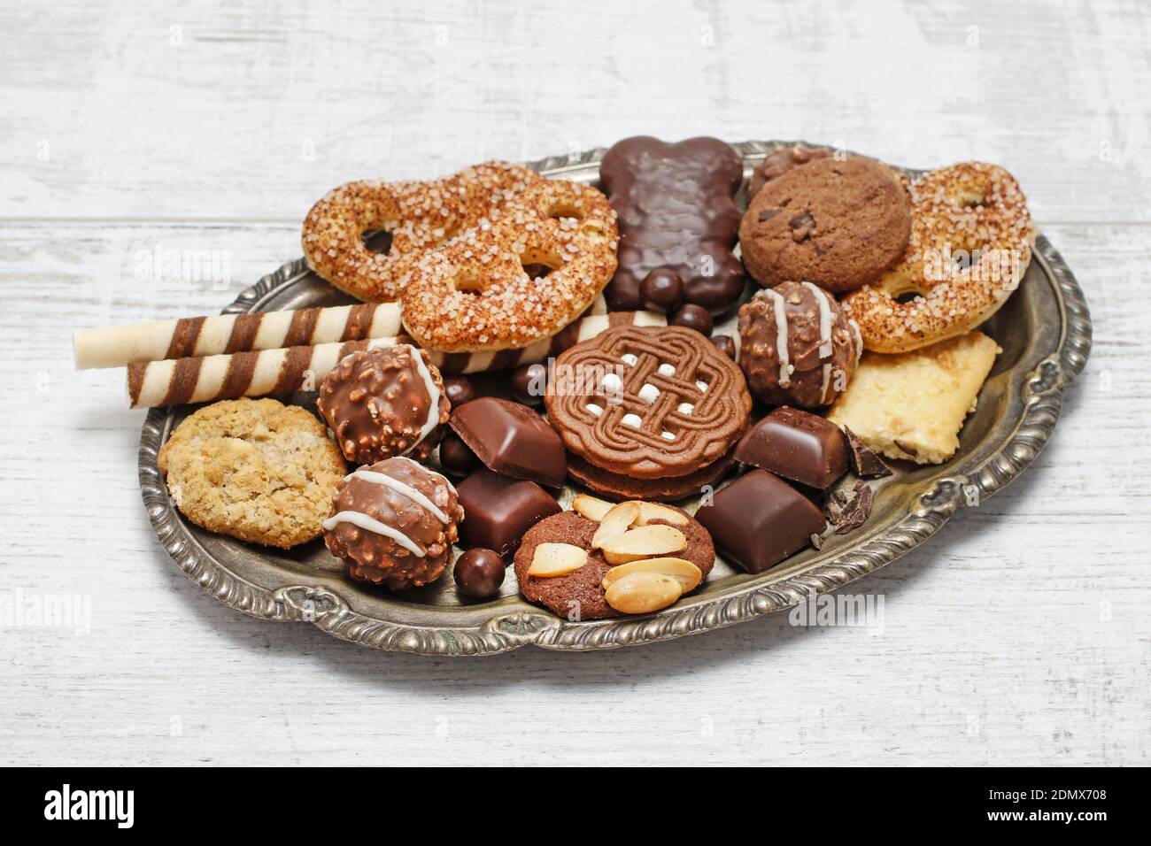 Mix of sweets: cookies, chocolates and pralines. Party dessert Stock ...
