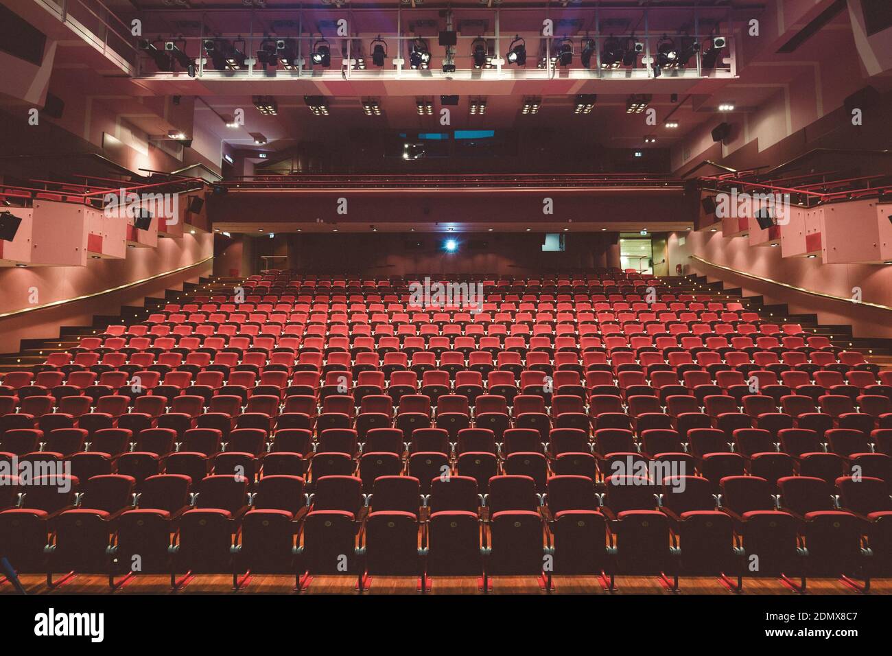 Interior of modern empty red congress hall Stock Photo - Alamy
