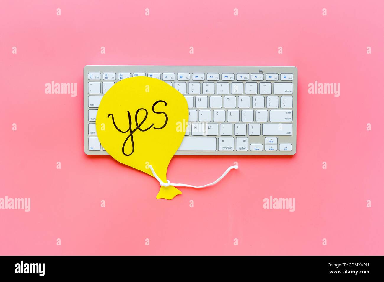 Yes agreement - decision concept. Word Yes on the keyboard, top view ...