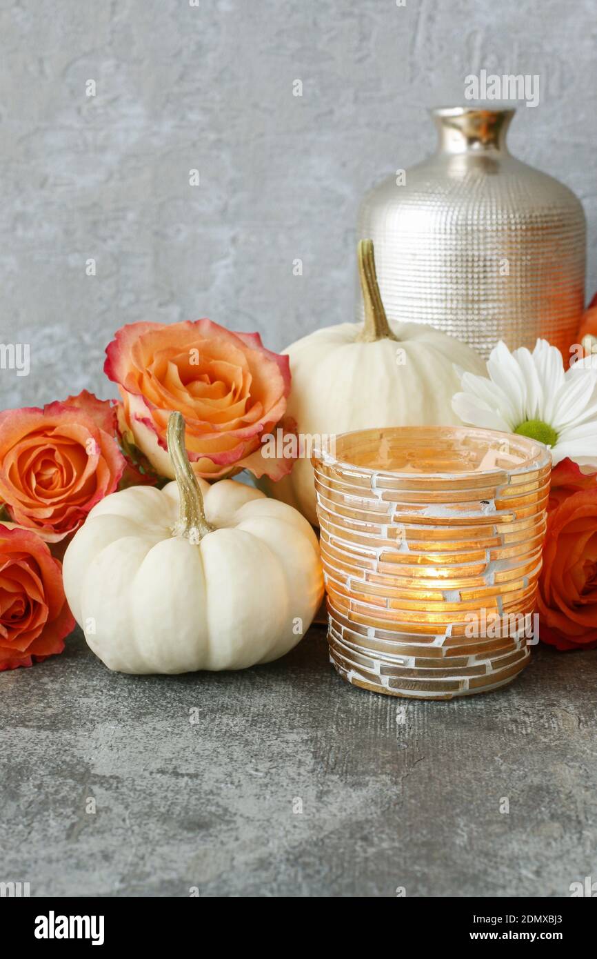Elegant autumn home decoration with white pumpkins (baby boo), roses ...