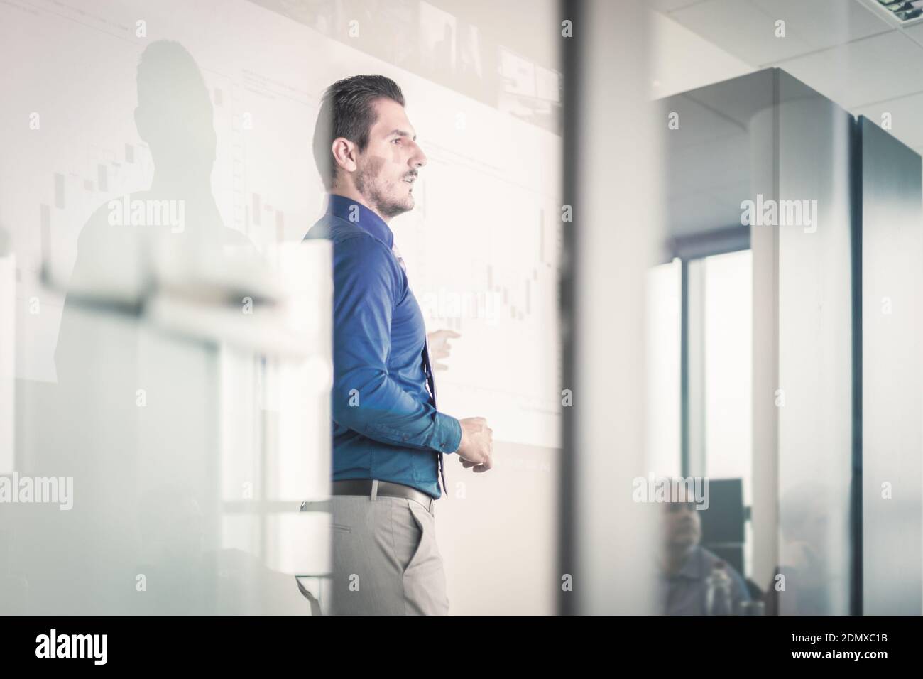 Manager giving business presentation on corporate meeting event Stock ...