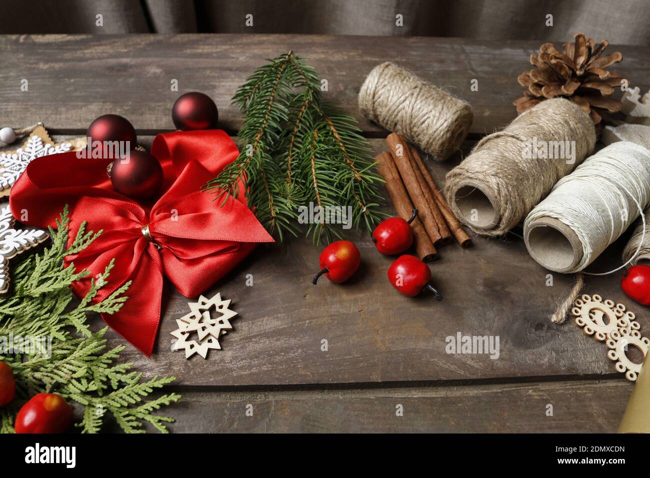 Woman shows how to beautifully pack Christmas presents. Step by step ...