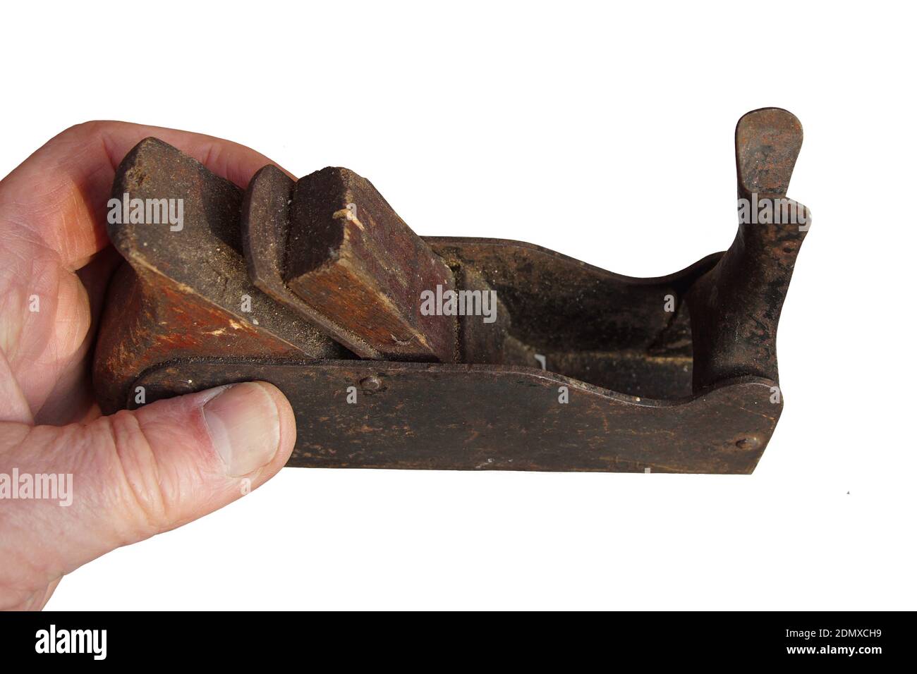 Vintage. Old rusty metal bodied small hand plane in de hand. Isolated ...