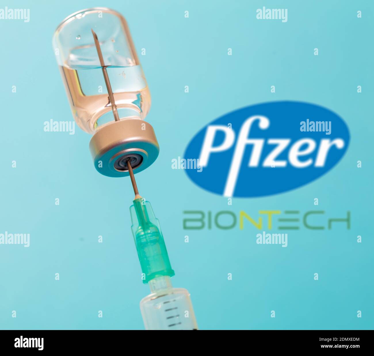 Athens, Greece. December 17, 2020. Pfizer and BioNTech logos on blue ...