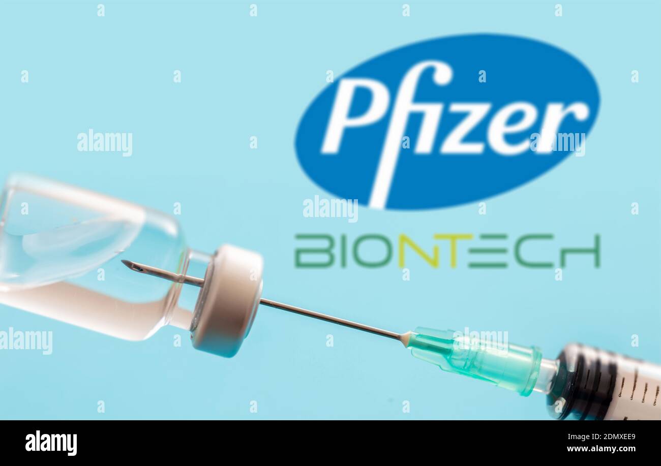 Athens, Greece. December 17, 2020. Pfizer and BioNTech logos on blue ...