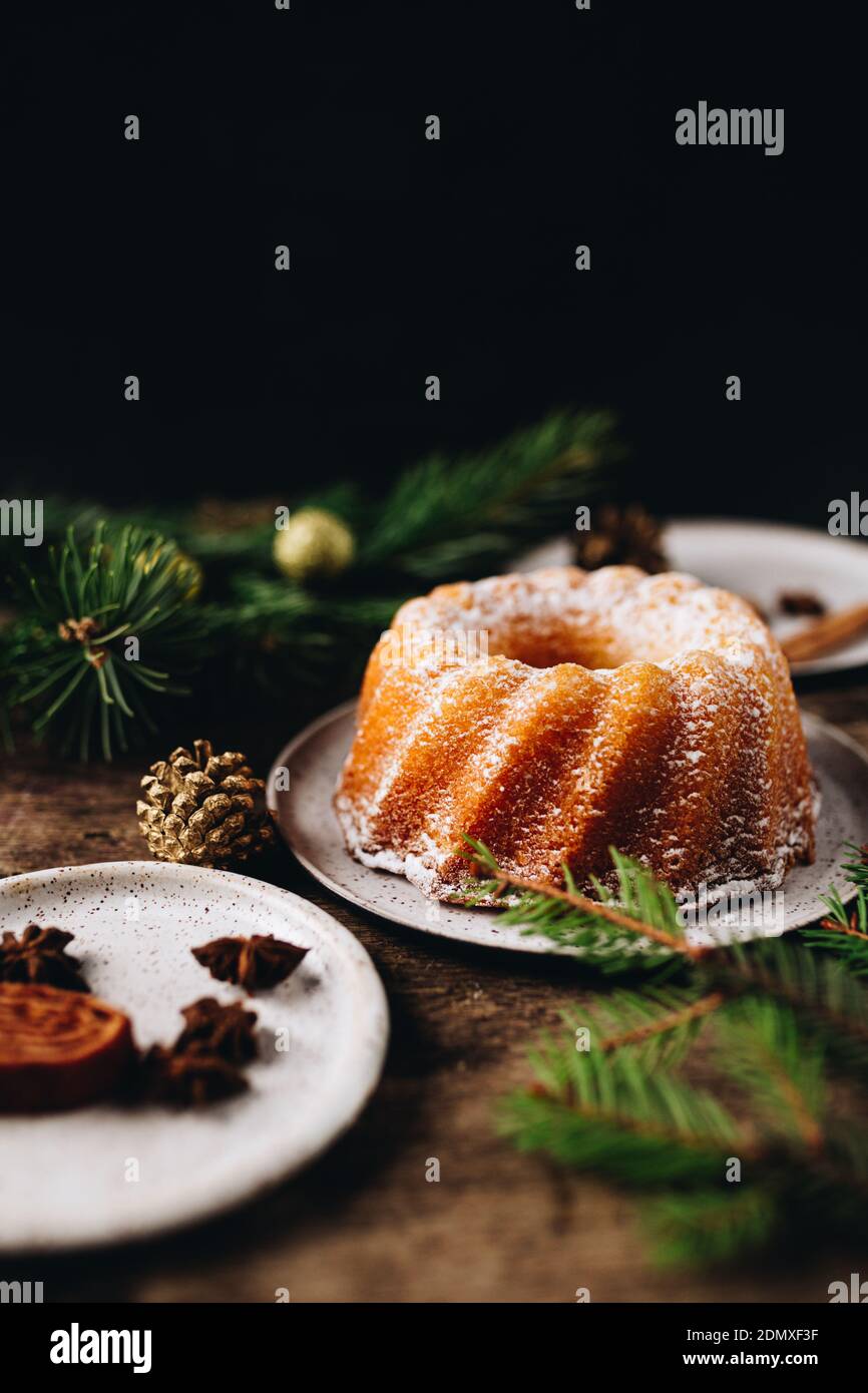 Guglhupf austrian cake with anise and cinnamon in a white plate with ...