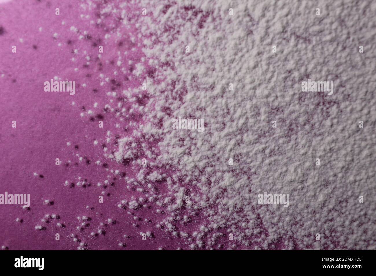 background flour or powdered sugar on a pink fuchsia background with a ...