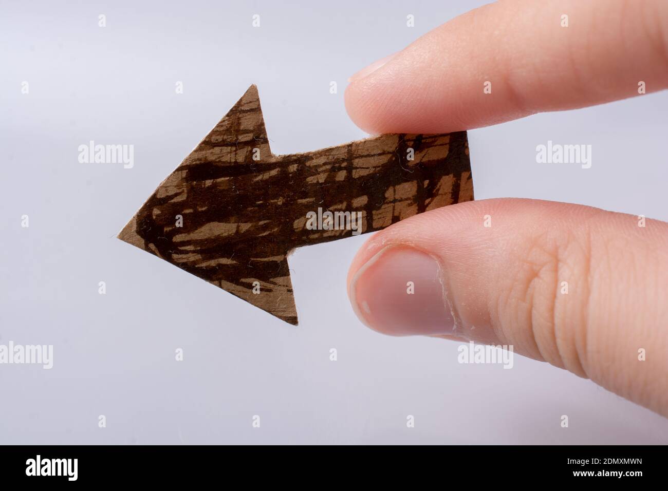 Hand Holding Arrow High Resolution Stock Photography and Images - Alamy