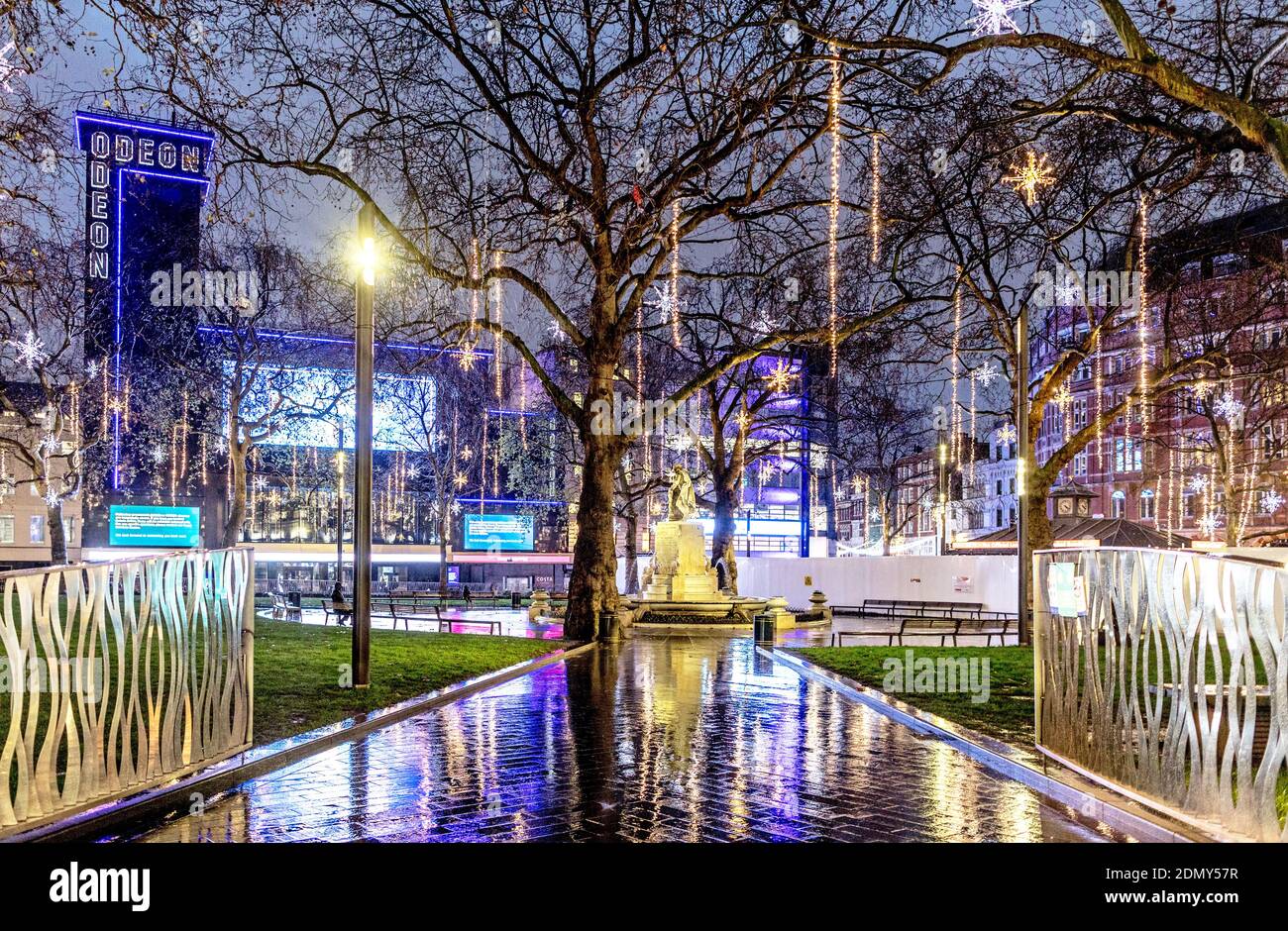 Statue in Leicester Square at Night London UK Stock Photo - Alamy