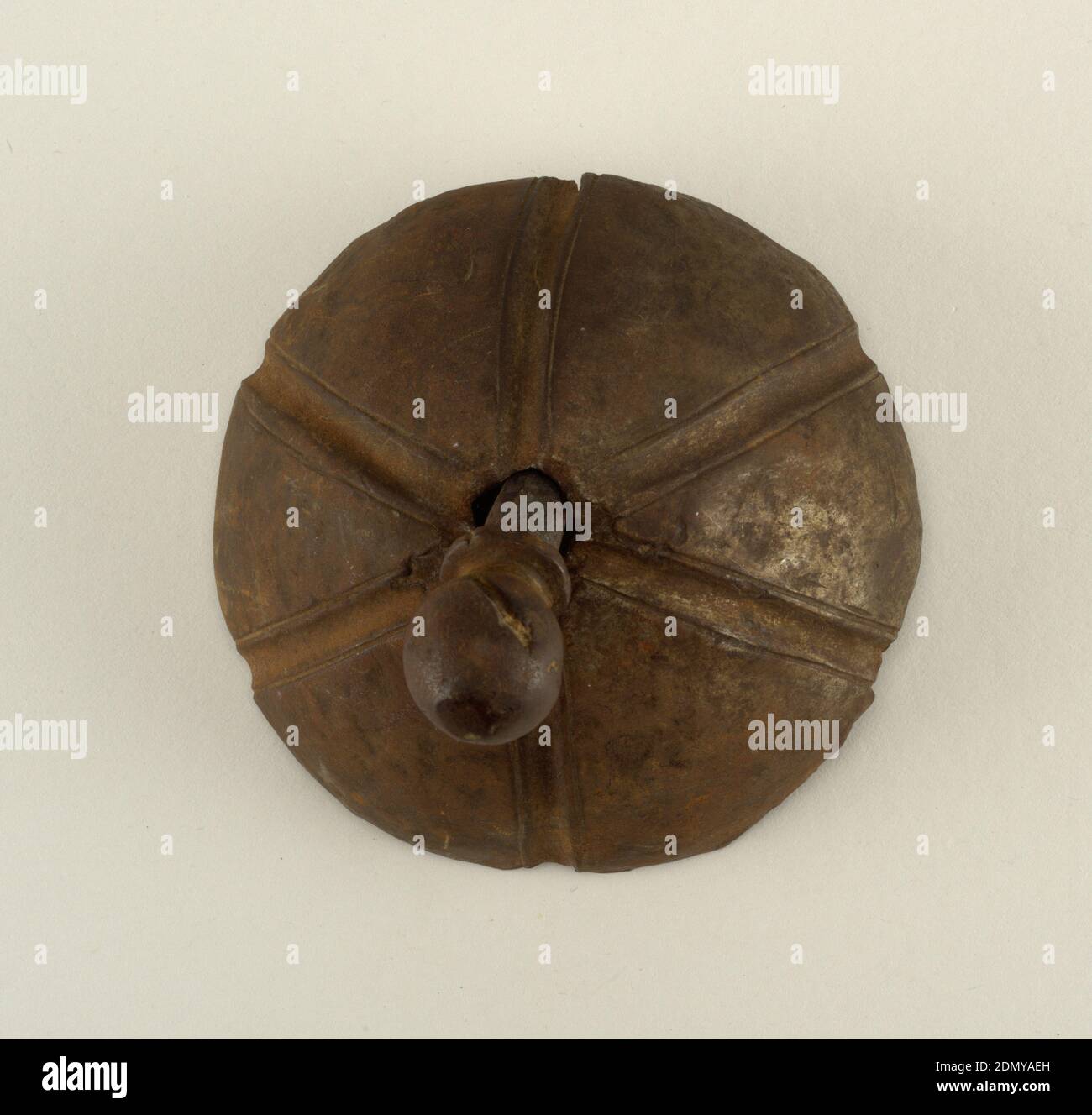 Decorative door boss and nail, Wrought iron, Hemispherical boss divided ...